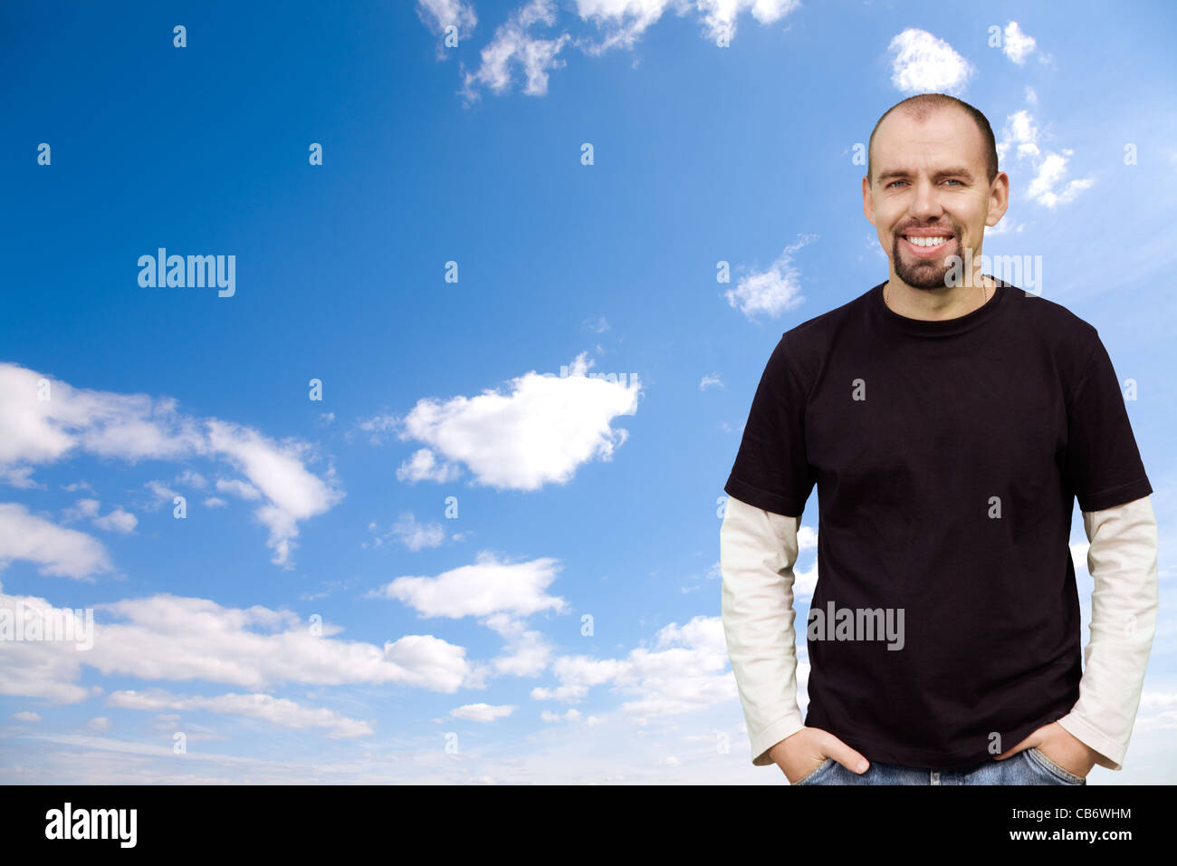 positive person on blue sky background Stock Photo - Alamy