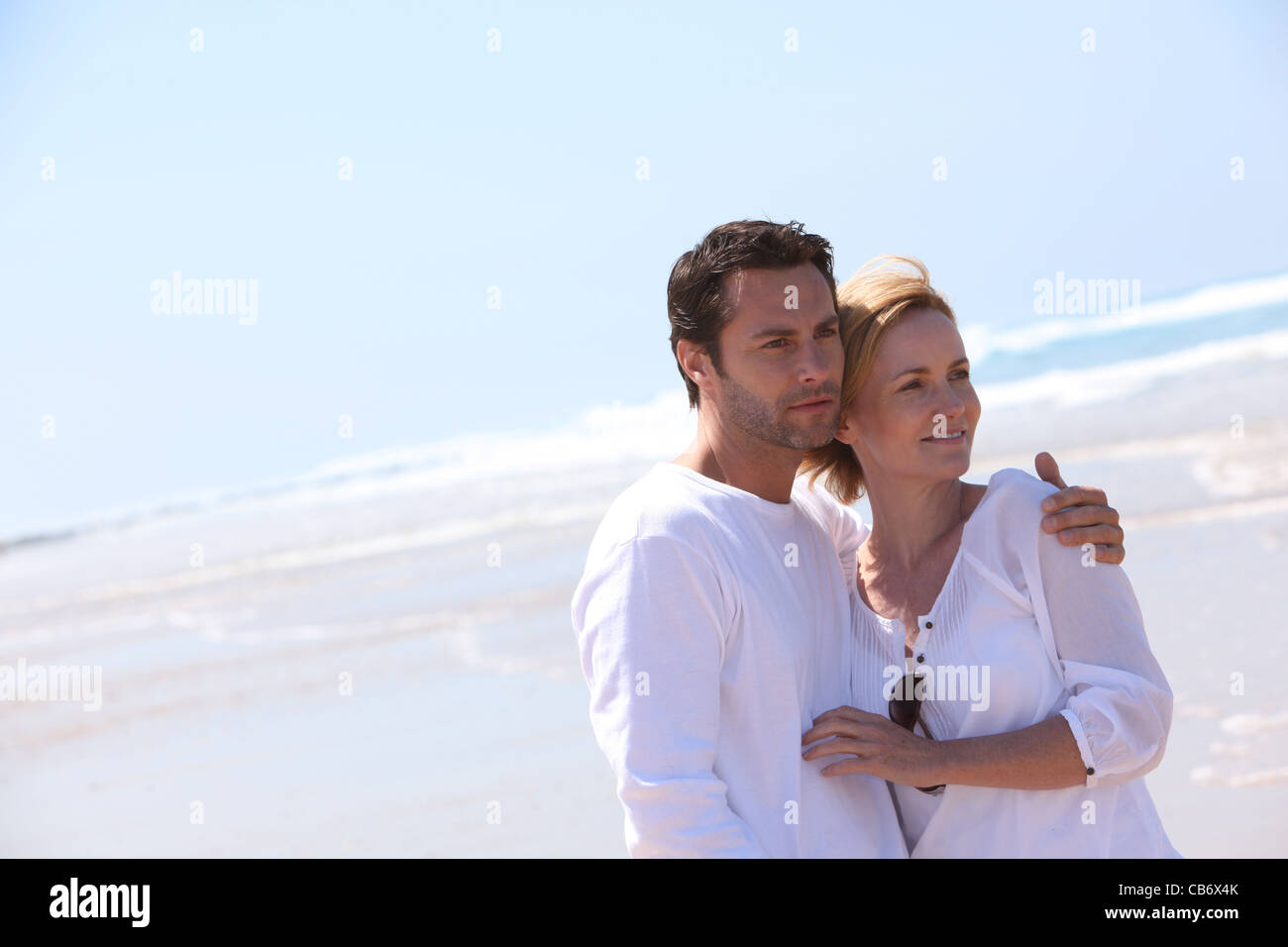 Couple at the seaside Stock Photo - Alamy