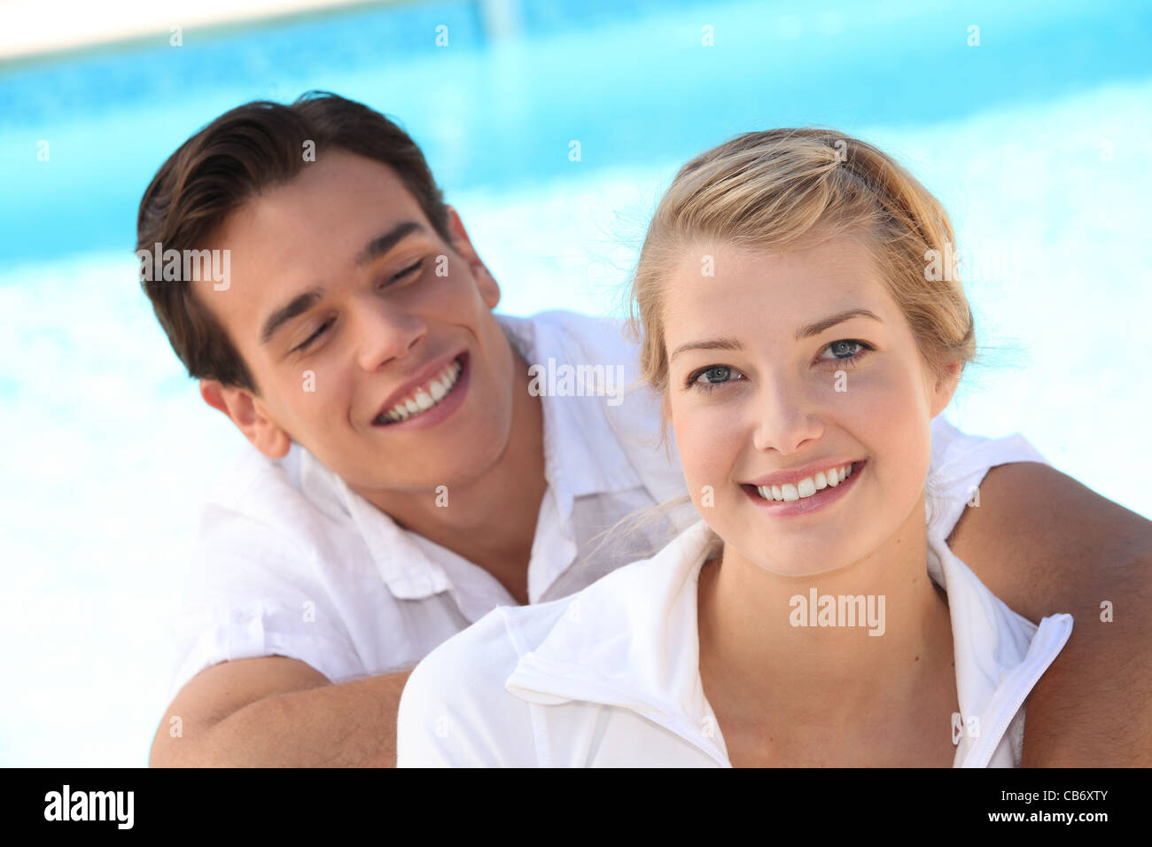 Young man gazing adoringly at his girlfriend Stock Photo - Alamy