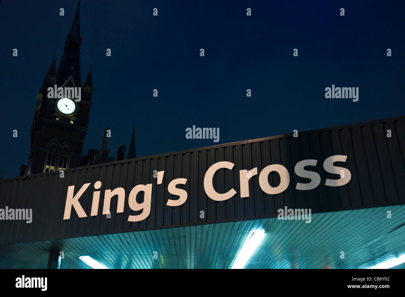 The main Kings Cross facade and sign at night Stock Photo - Alamy