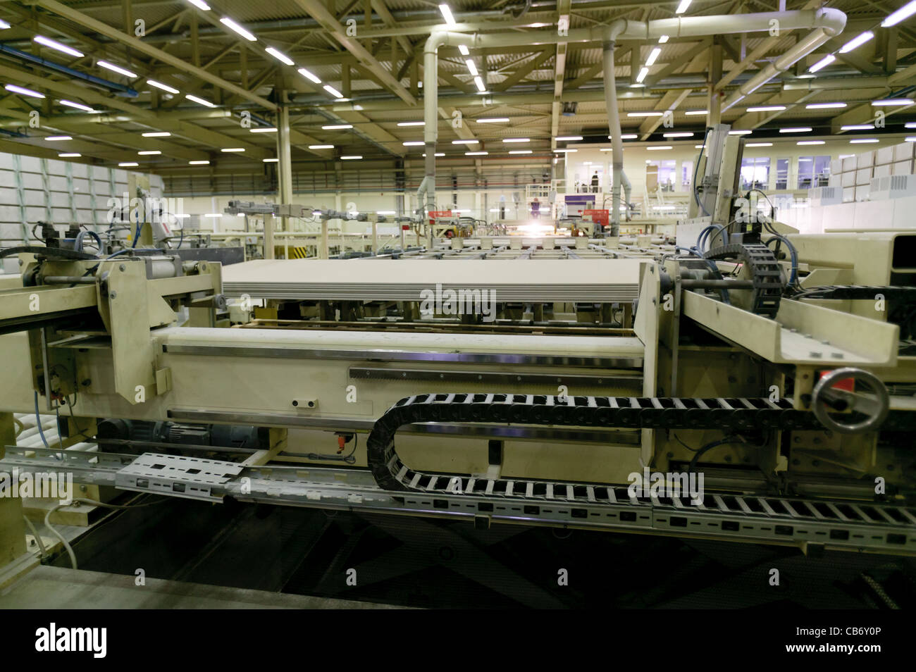 Technological line for production of gypsum boards Stock Photo - Alamy
