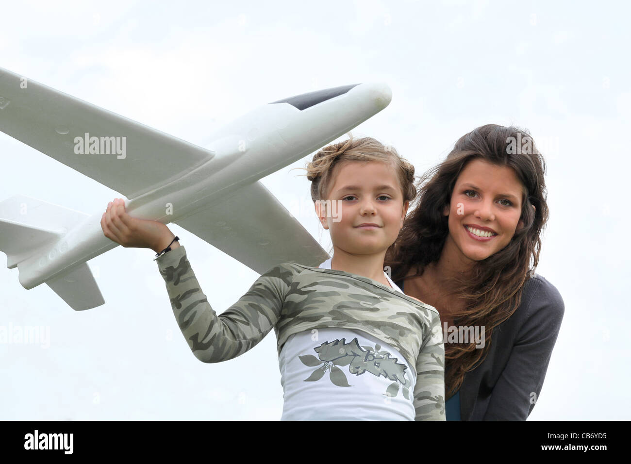 Girl with model aeroplane Stock Photo - Alamy