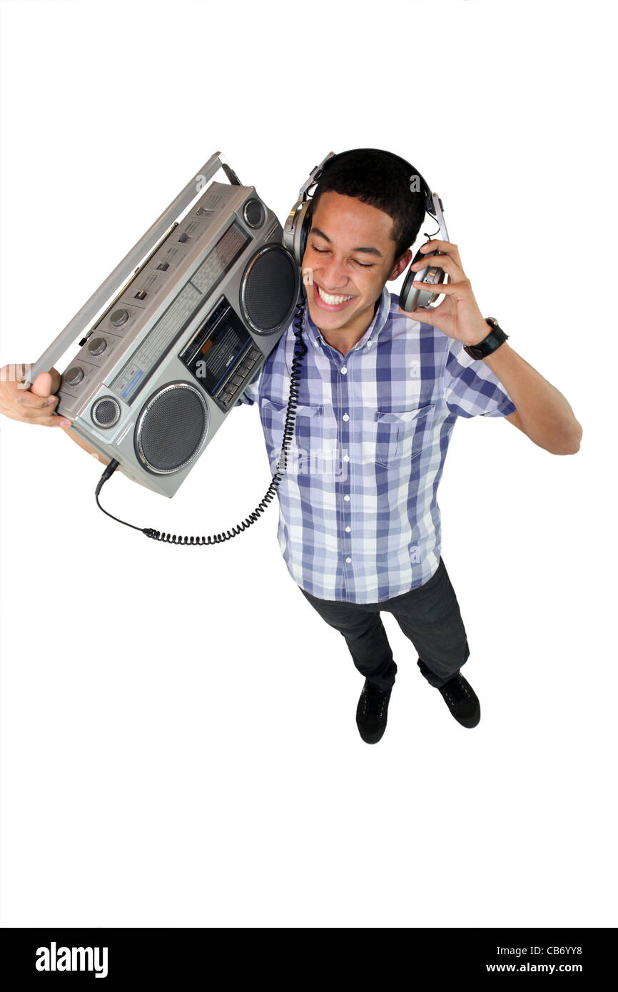 Young man listening to a cassette player Stock Photo - Alamy