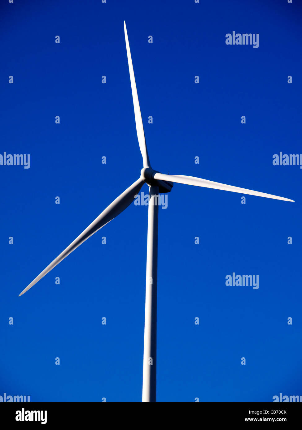 Wind turbine and blue sky Stock Photo - Alamy