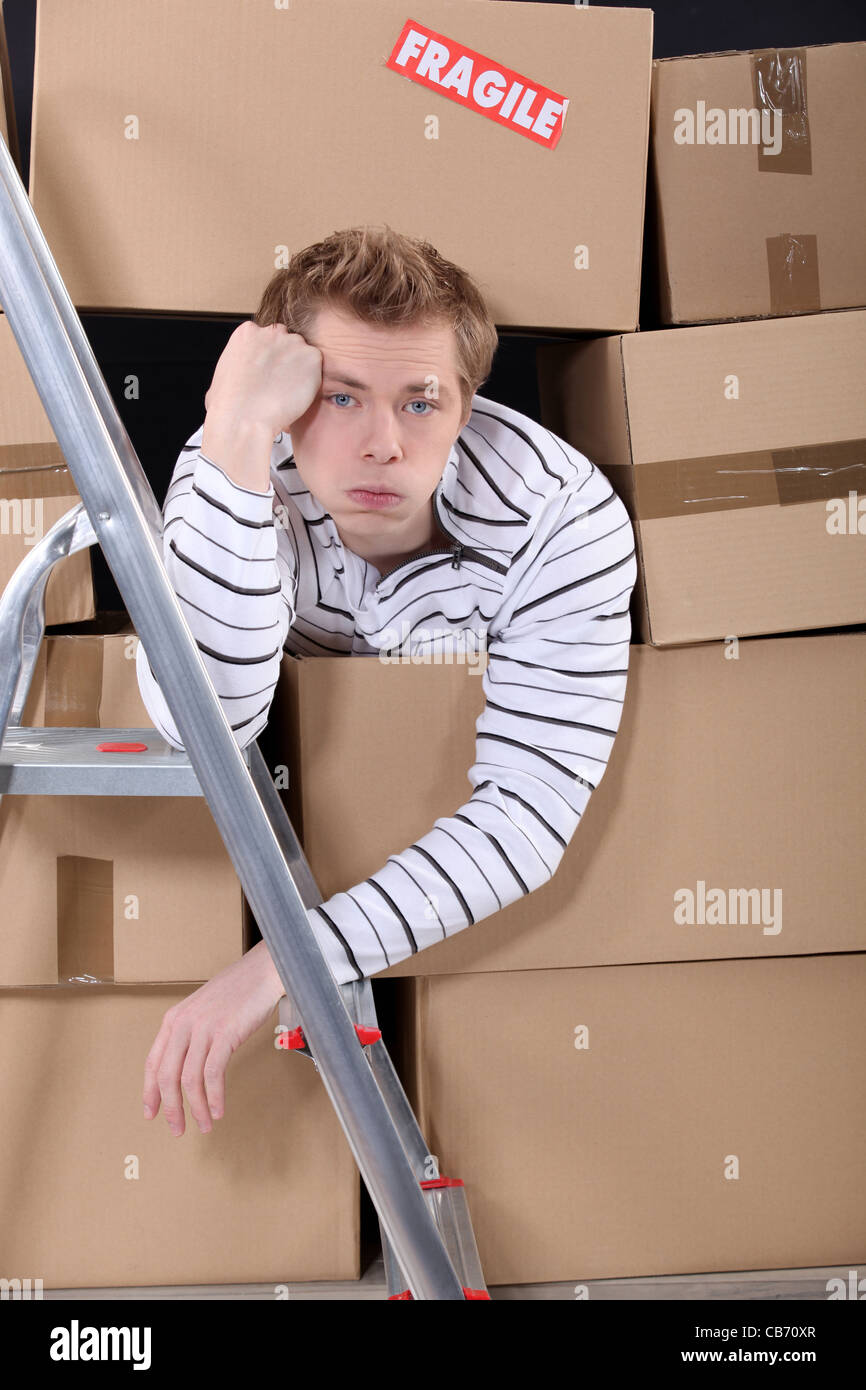 A young man moving out Stock Photo - Alamy