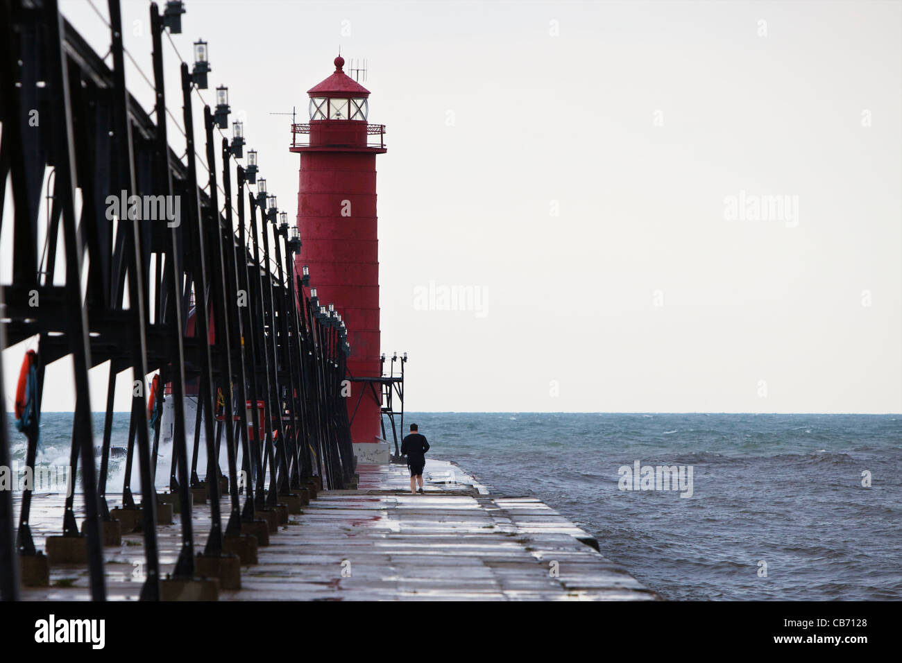 Running towards lighthouse hi-res stock photography and images - Alamy