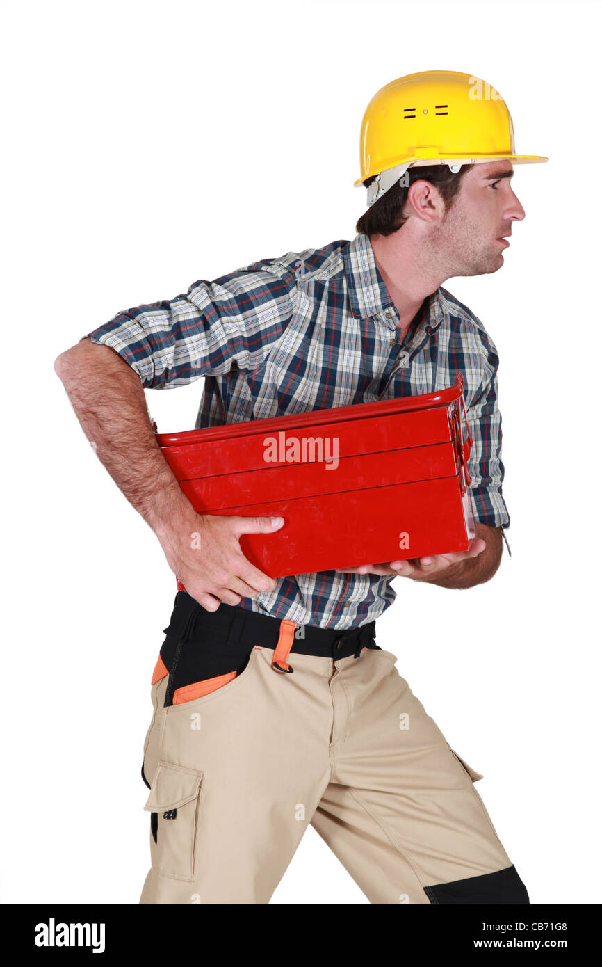 craftsman running and holding a toolbox Stock Photo - Alamy
