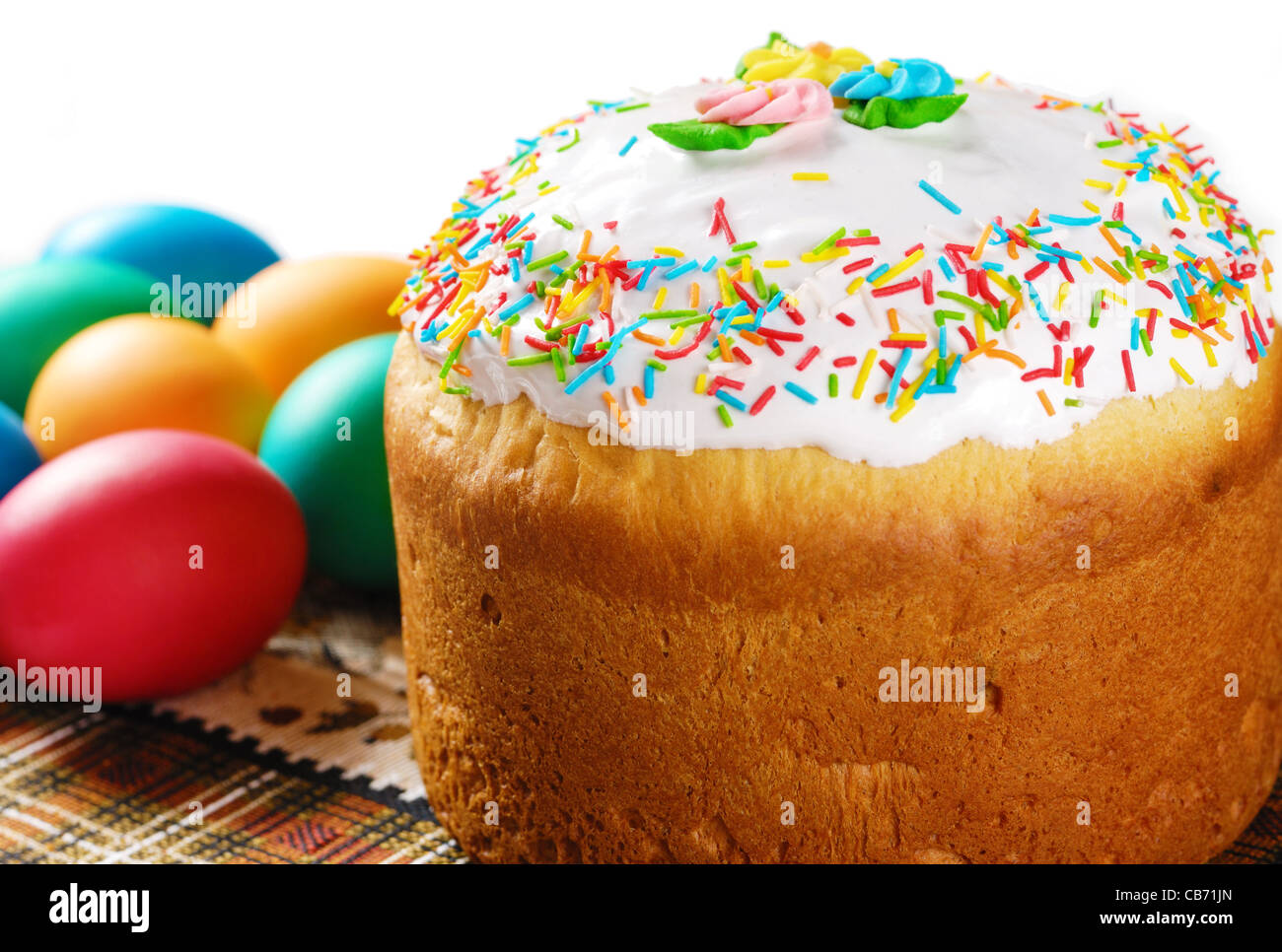Easter eggs and cake on the bright background Stock Photo - Alamy