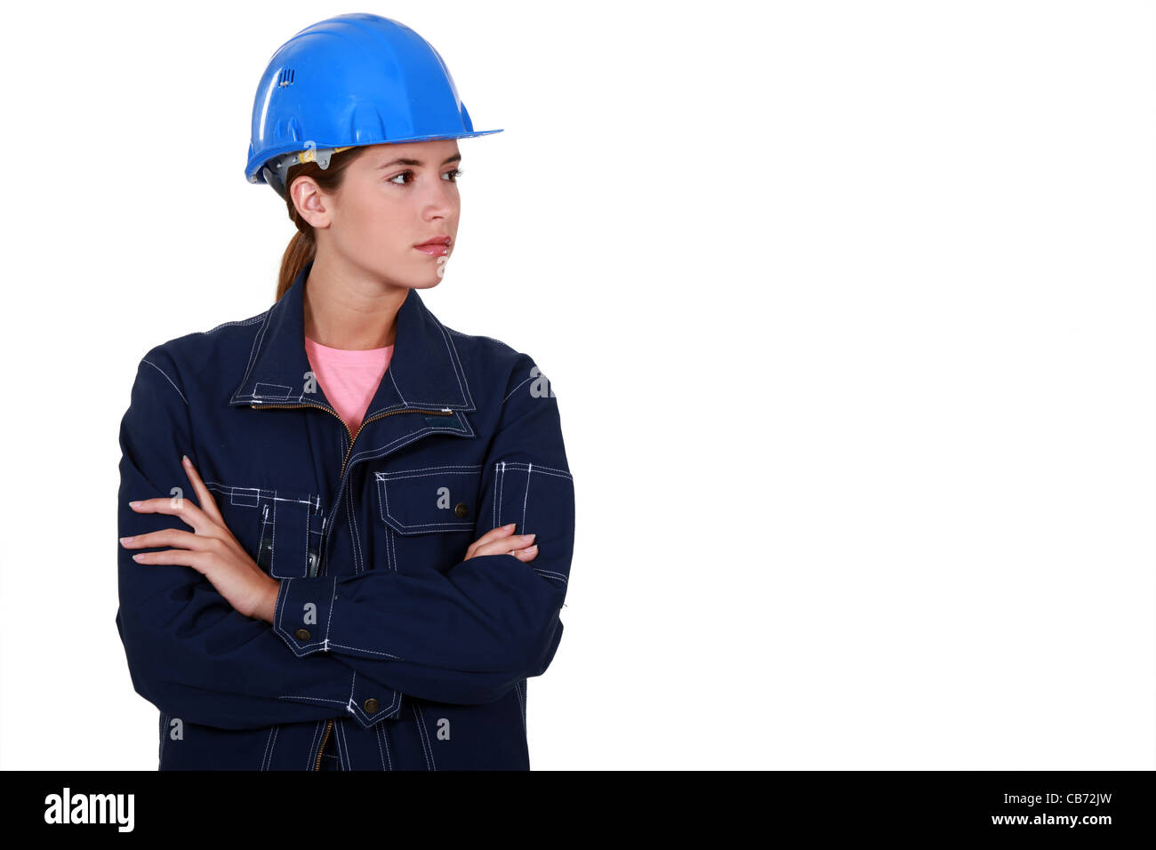 A waiting female manual worker Stock Photo - Alamy