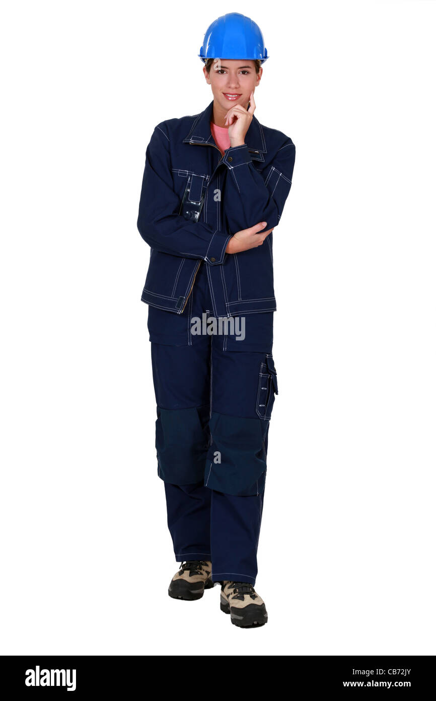 Female plumber standing on white background Stock Photo - Alamy