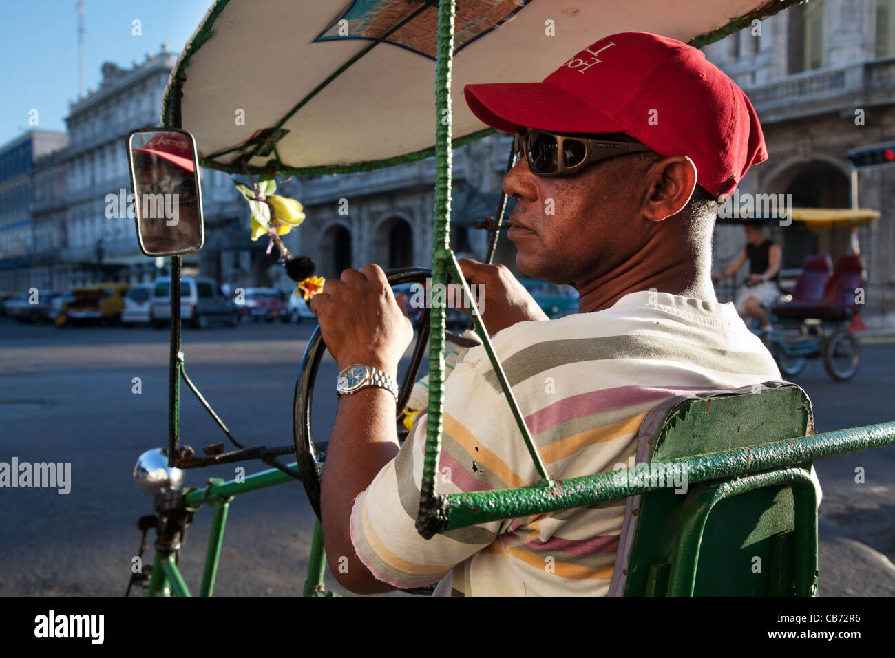 A "Bicitaxi" driver awaiting customers, Havana (La Habana), Cuba Stock ...