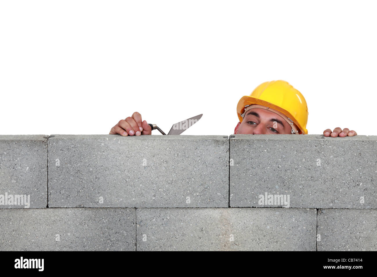 Man peering over wall hi-res stock photography and images - Alamy
