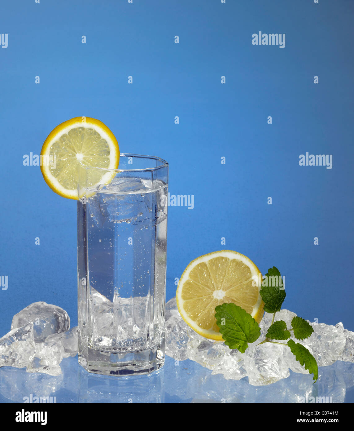 studio photography of a glass with transparent refreshment drink ...