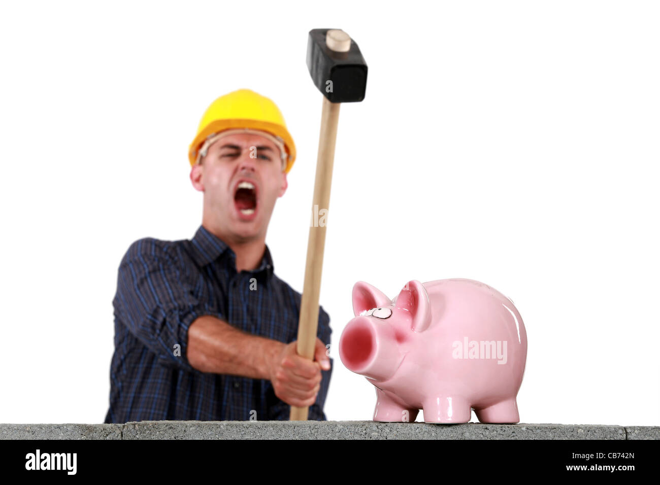 Breaking a piggy bank hi-res stock photography and images - Alamy