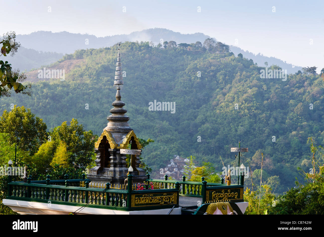 Chedi (stupa) with banister at Thai temple in Maesai Thailand with ...