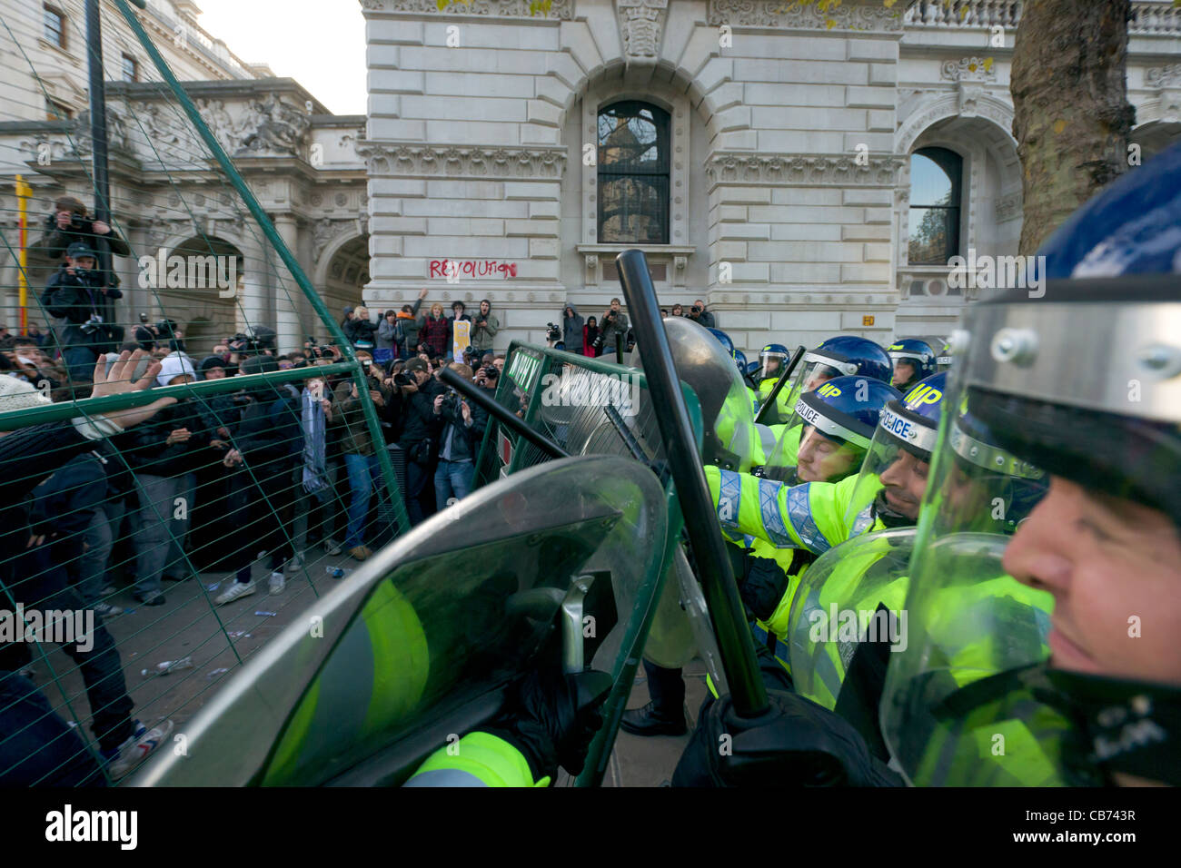 Protestors throwing a barrier at a police line on Whitehall, Day X ...