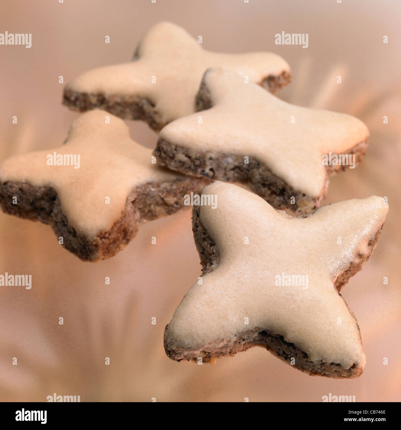 four cinnamon-flavored cookies in light blurry back Stock Photo - Alamy