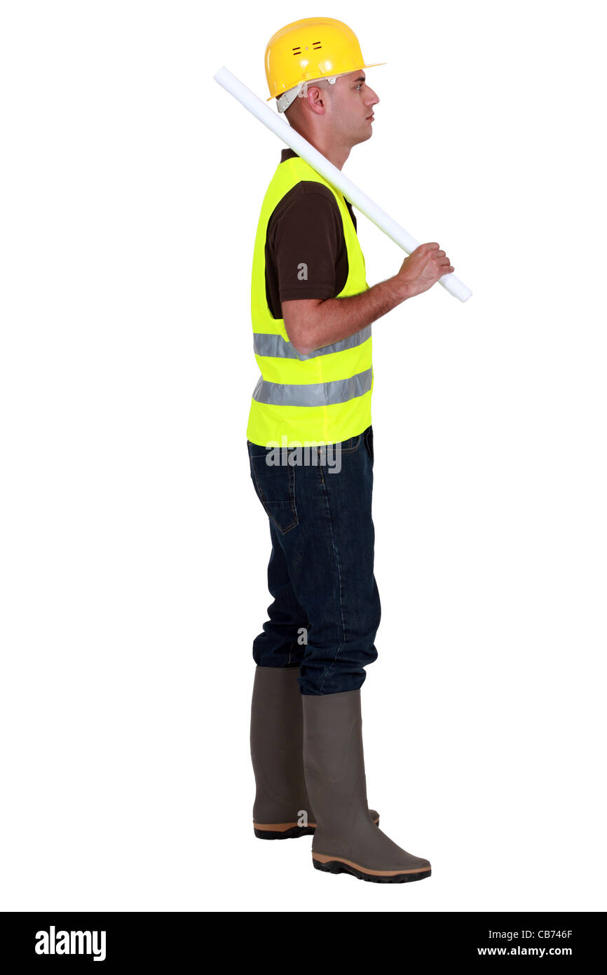 Profile of a worker with plans Stock Photo - Alamy