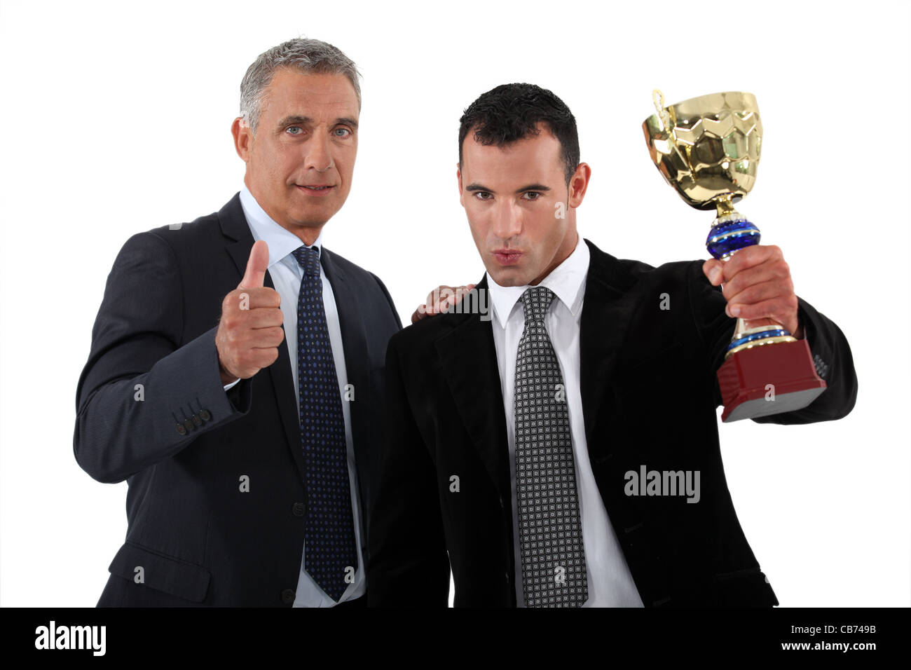 Trophy holding aloft hi-res stock photography and images - Alamy