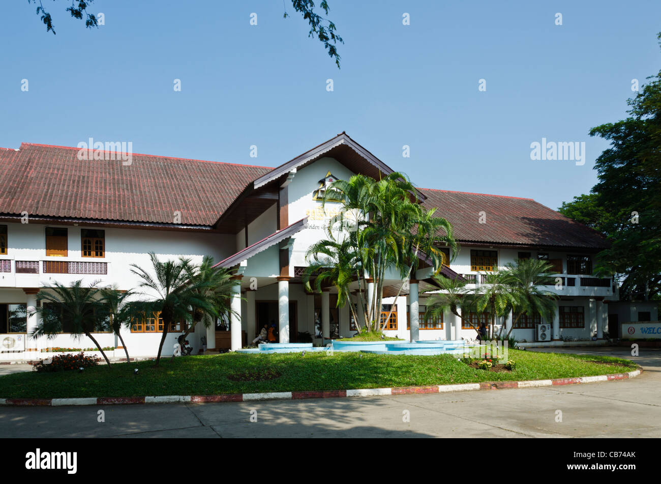 Golden Triangle Hotel on hilltop with tropical palm trees in Tachileik ...