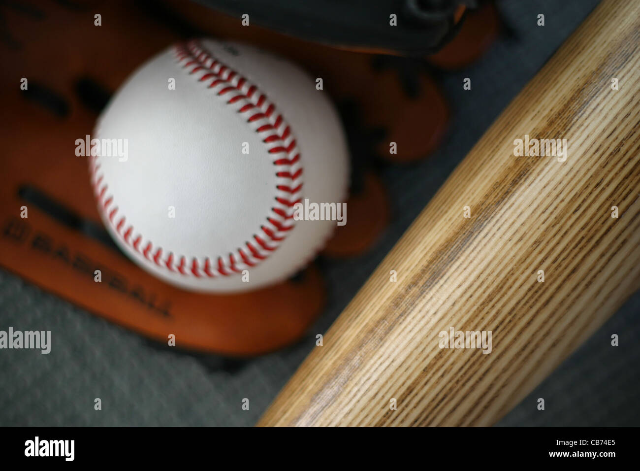 Baseball bat, ball and mitt glove, sports equipment close ups Stock ...