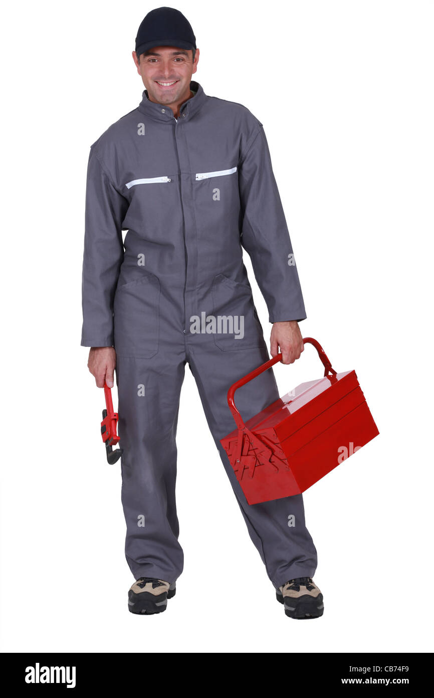 Plumber with wrench and tool box Stock Photo - Alamy