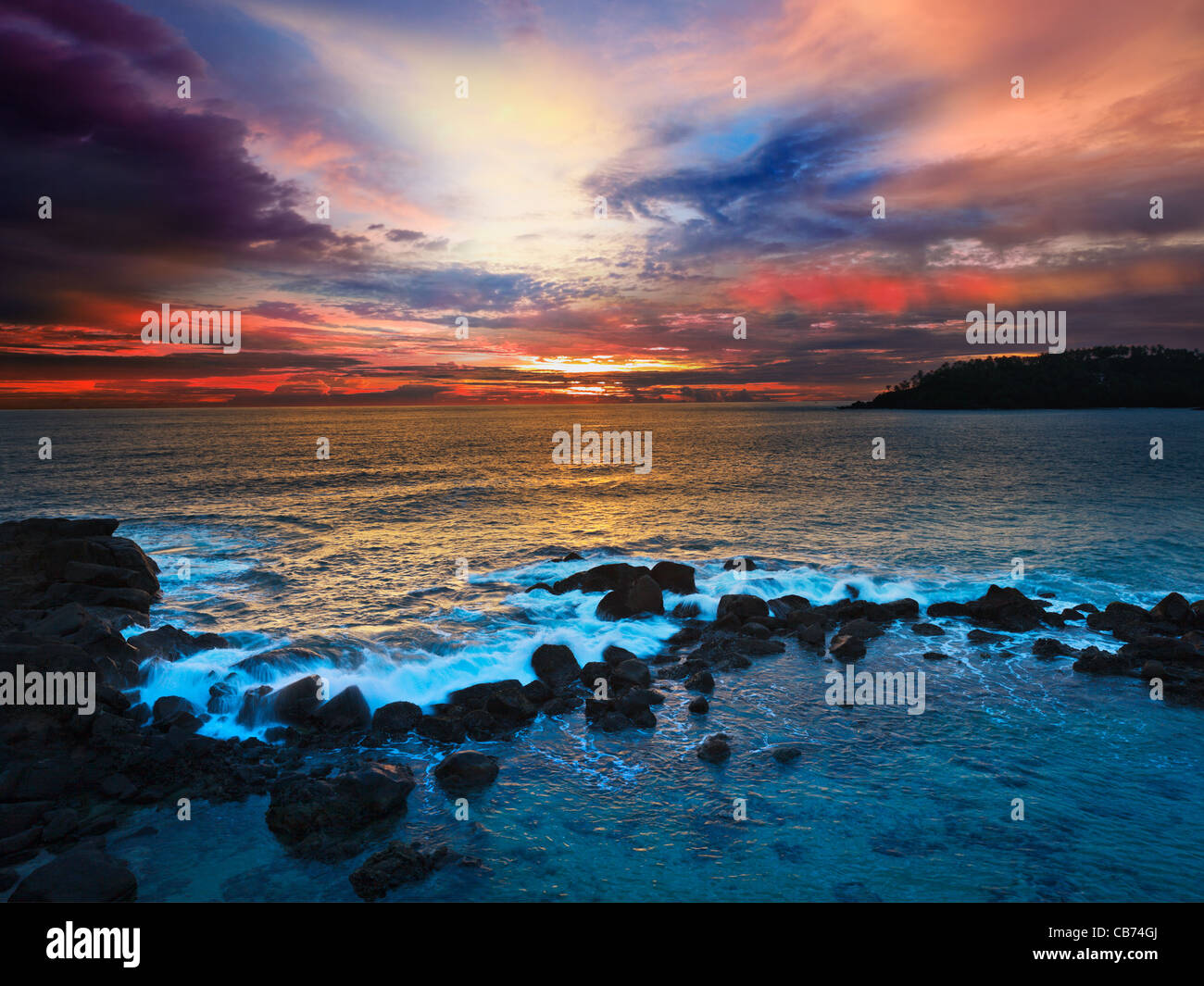 Rocky coast. Sunset Stock Photo - Alamy