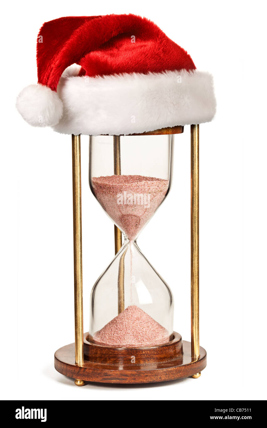 Christmas is coming concept - hourglass with Santa Claus hat isolated ...