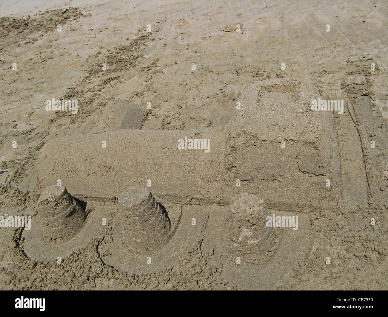 Train sandcastle on beach - made during summer holiday Stock Photo - Alamy