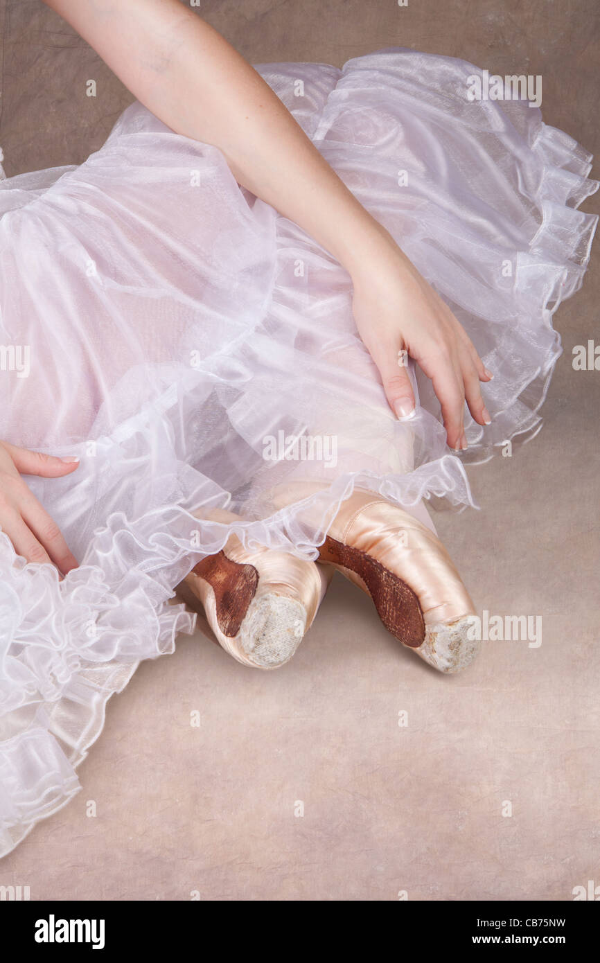 Ballet Pose Sitting Down Wearing Ballet Shoes Stock Photo - Alamy
