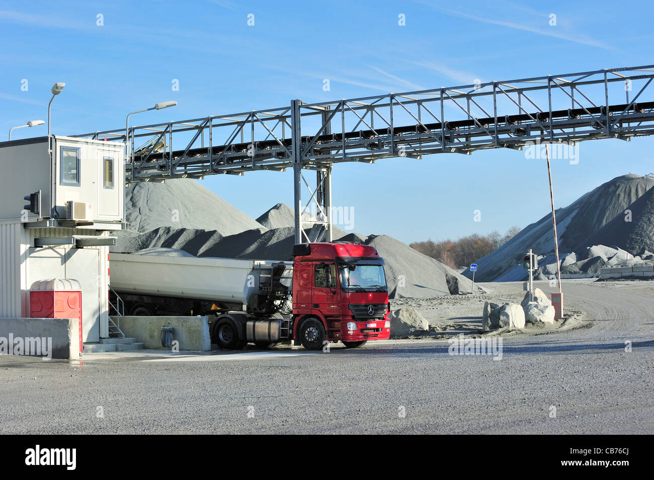 Truck leaving weighbridge at porphyry quarry, open-pit mine for the ...