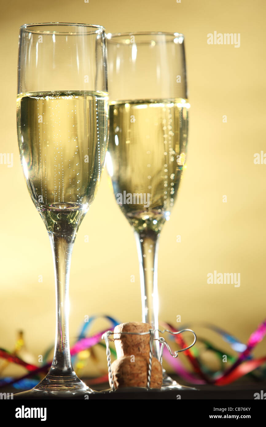 Flutes of champagne in holiday setting,Closeup Stock Photo - Alamy
