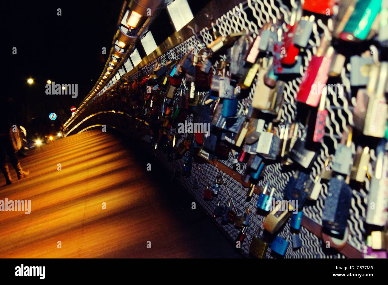 Love locks, bridge over the Vistula or Wiszla, Krakow, Poland.These ...
