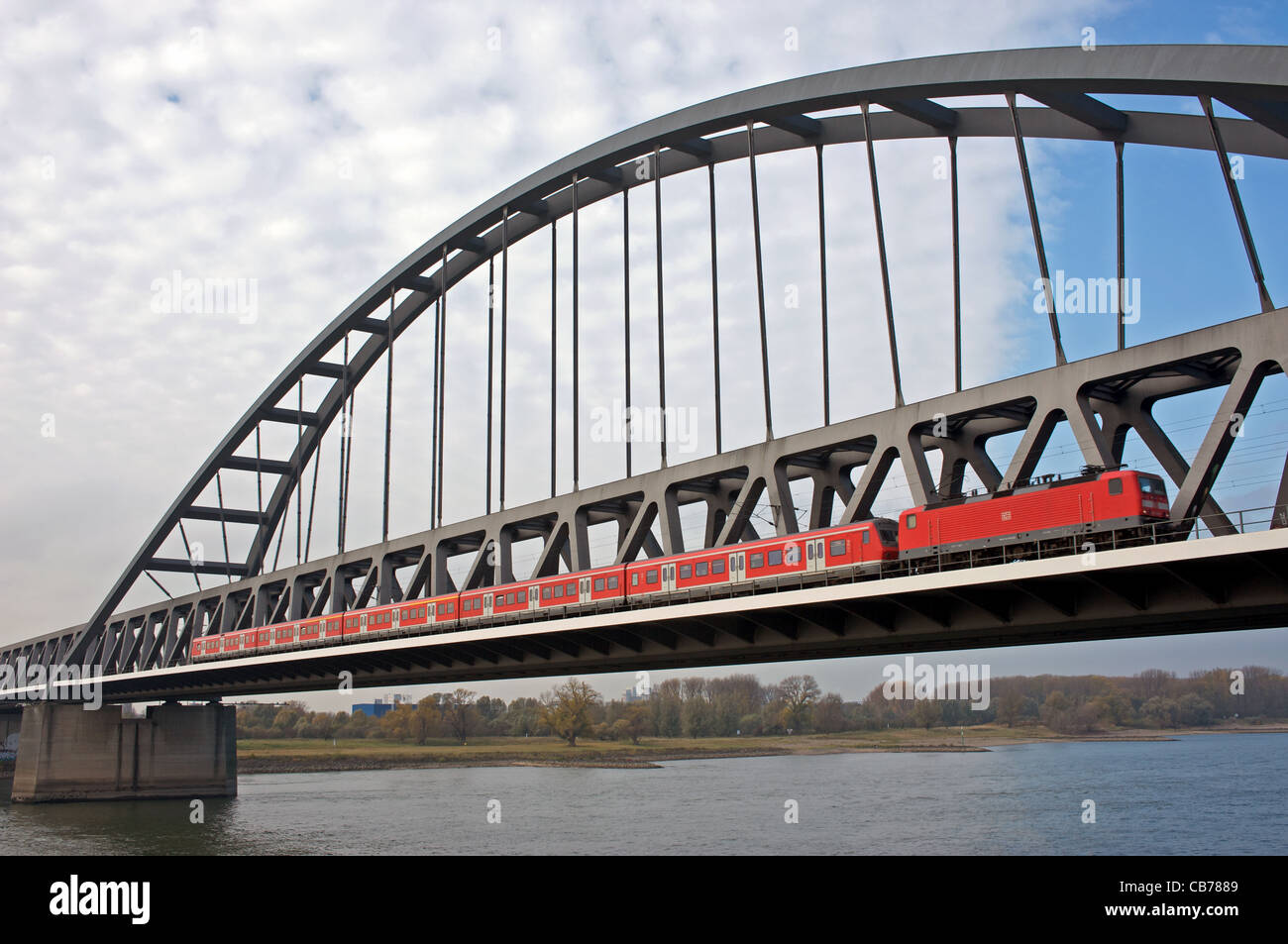 Railway bridge with a Rhine-Ruhr S-Bahn (suburban passenger train ...