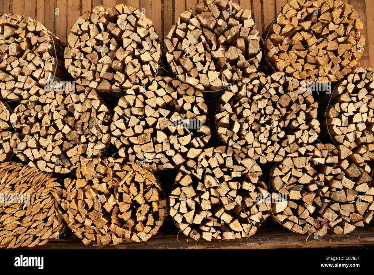 Stacked bundles of firewood Stock Photo - Alamy