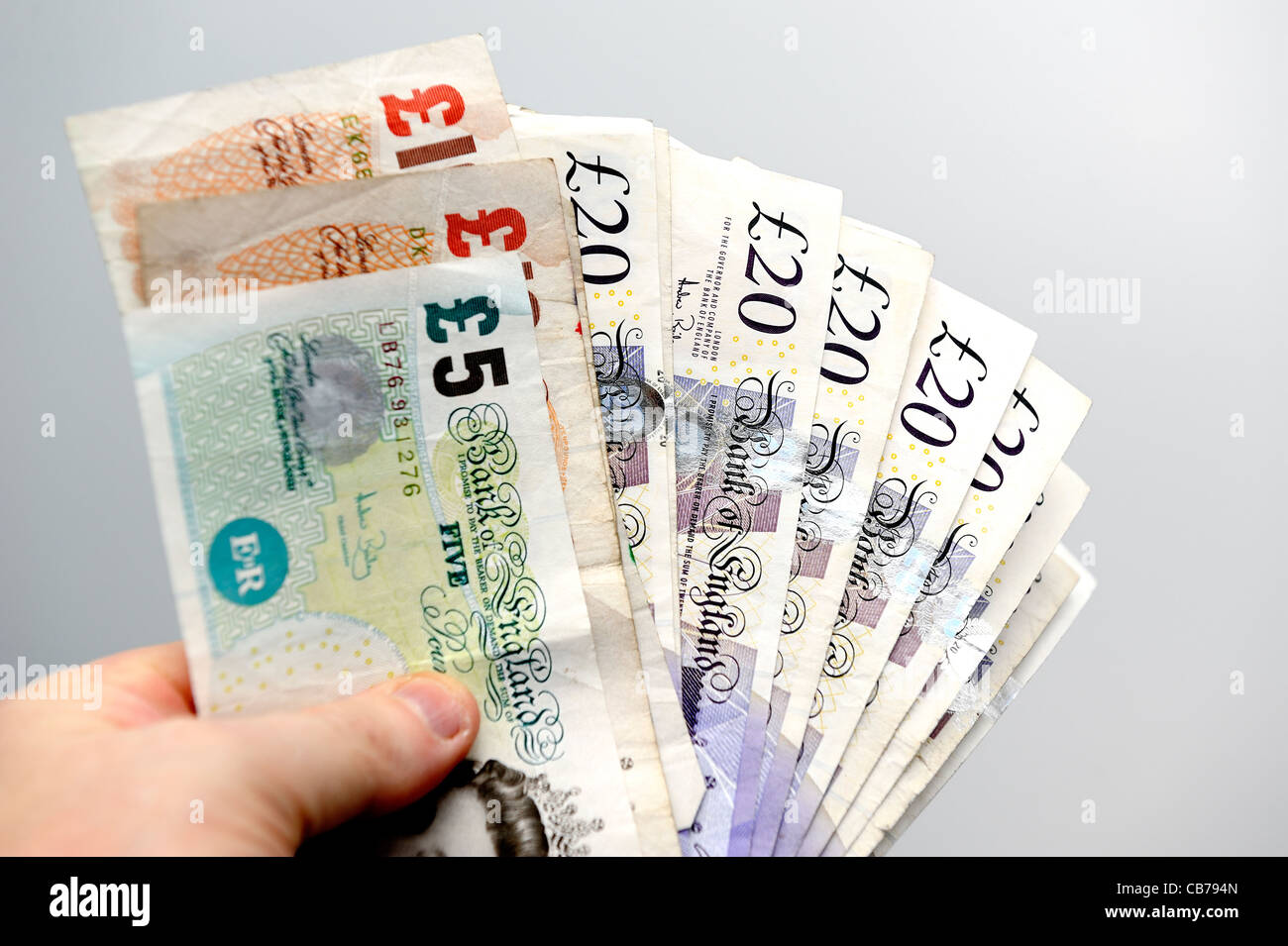 cash in the hand england uk Stock Photo - Alamy