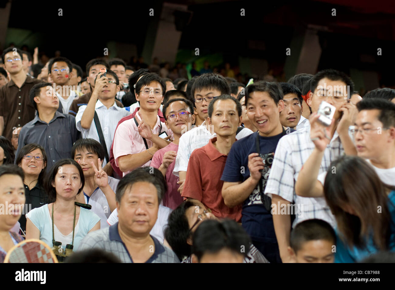 Paralympic Games showing Chinese spectators in the stands cheering all ...