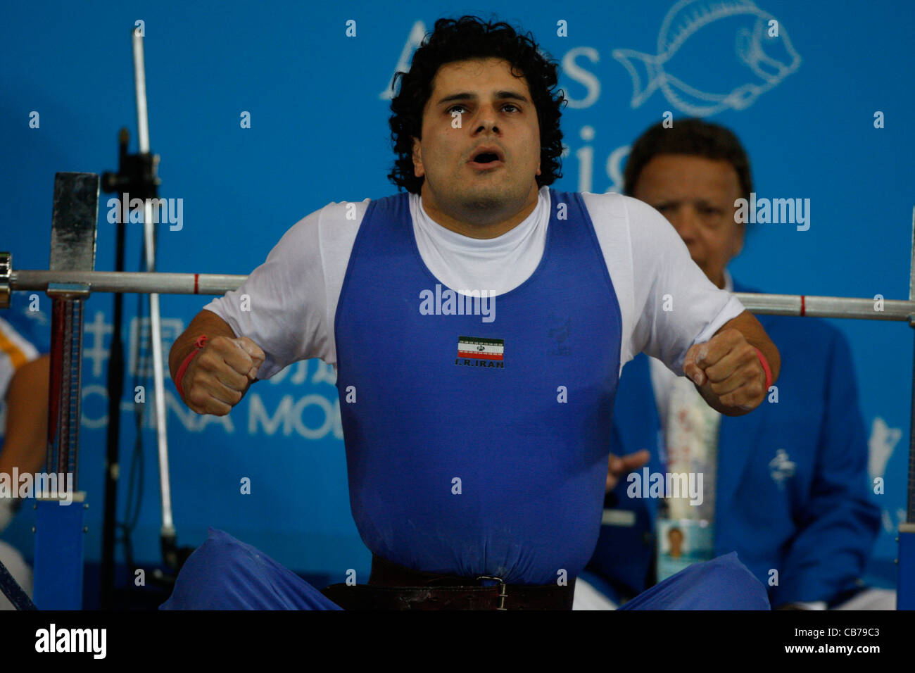 athletic competition at the 2008 Paralympic Games showing male athlete ...