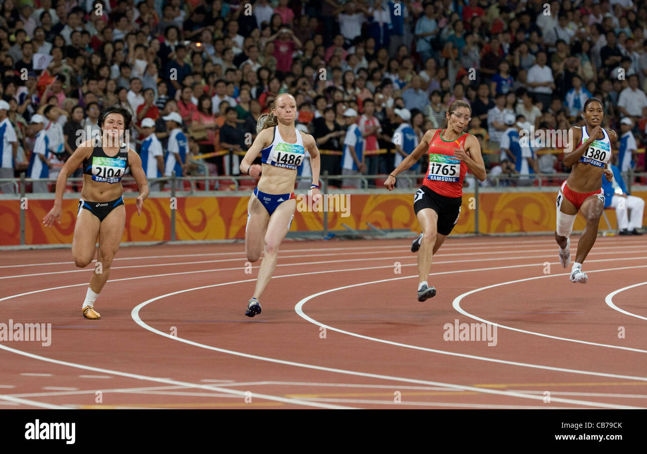 athletic competition at the 2008 Paralympic Games showing women's T13 ...