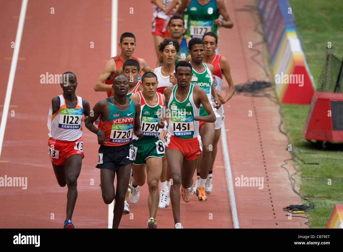 athletic competition at the 2008 Paralympic Games showing men athletes ...