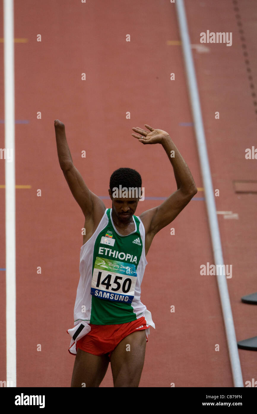 athletic competition at the 2008 Paralympic Games with disabled male ...