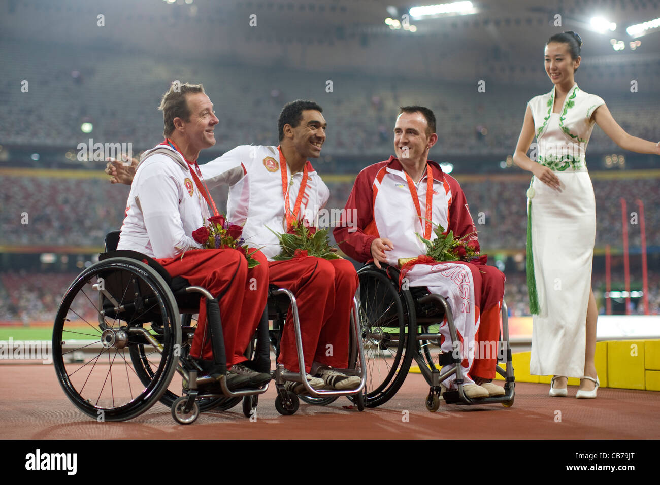 athletic competition at the 2008 Paralympic Games showing Canadian and ...