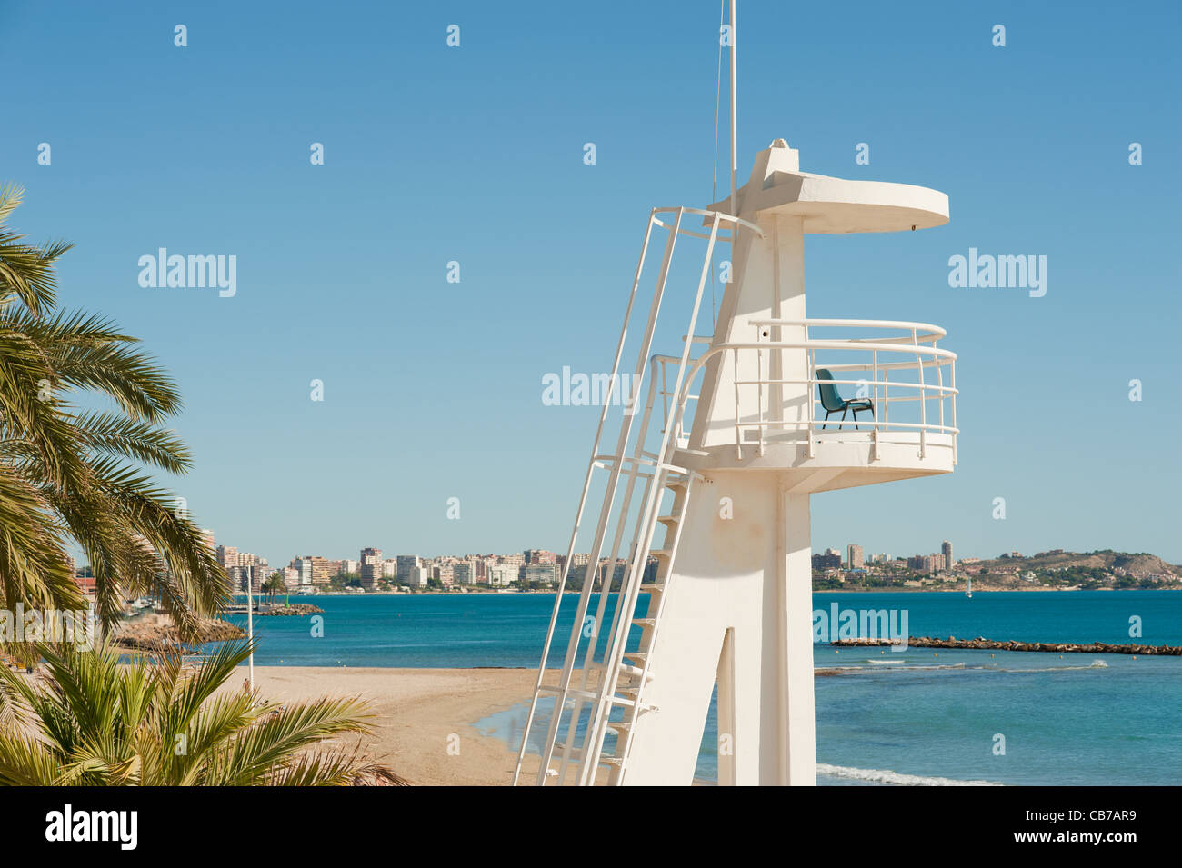 Concrete lifeguard watchtower over a sunny Mediterranean beach Stock ...