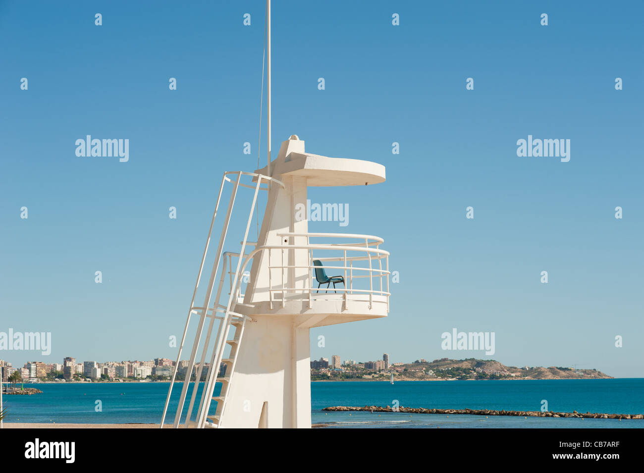Concrete lifeguard watchtower over a sunny Mediterranean beach Stock ...