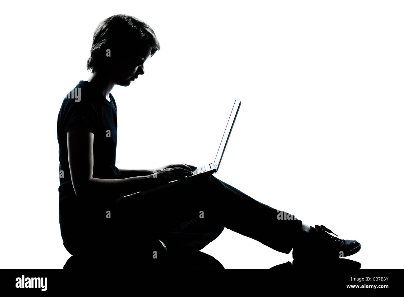 Silhouette child laptop hi-res stock photography and images - Alamy