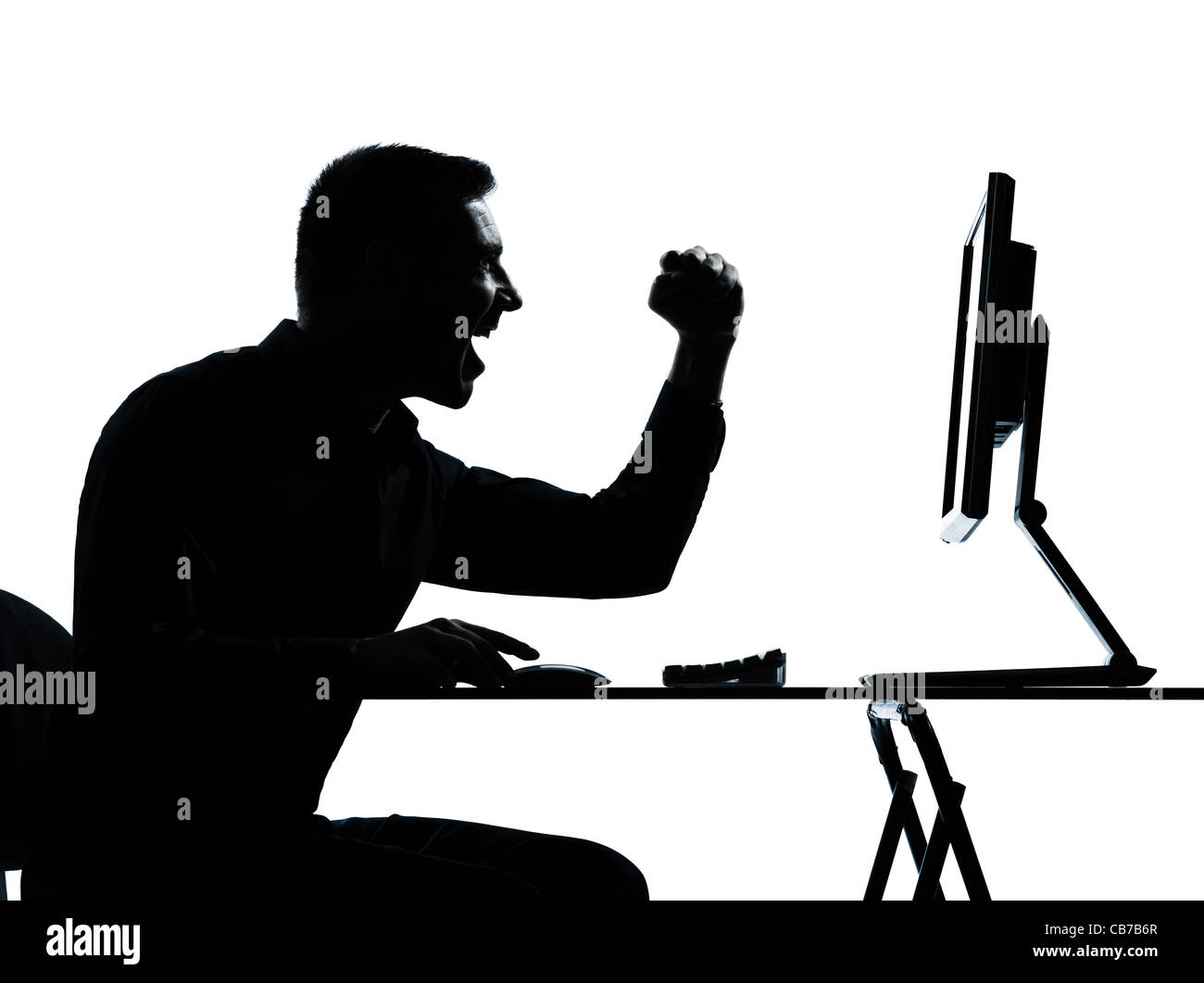 one business man computer computing happy portrait silhouette in studio ...