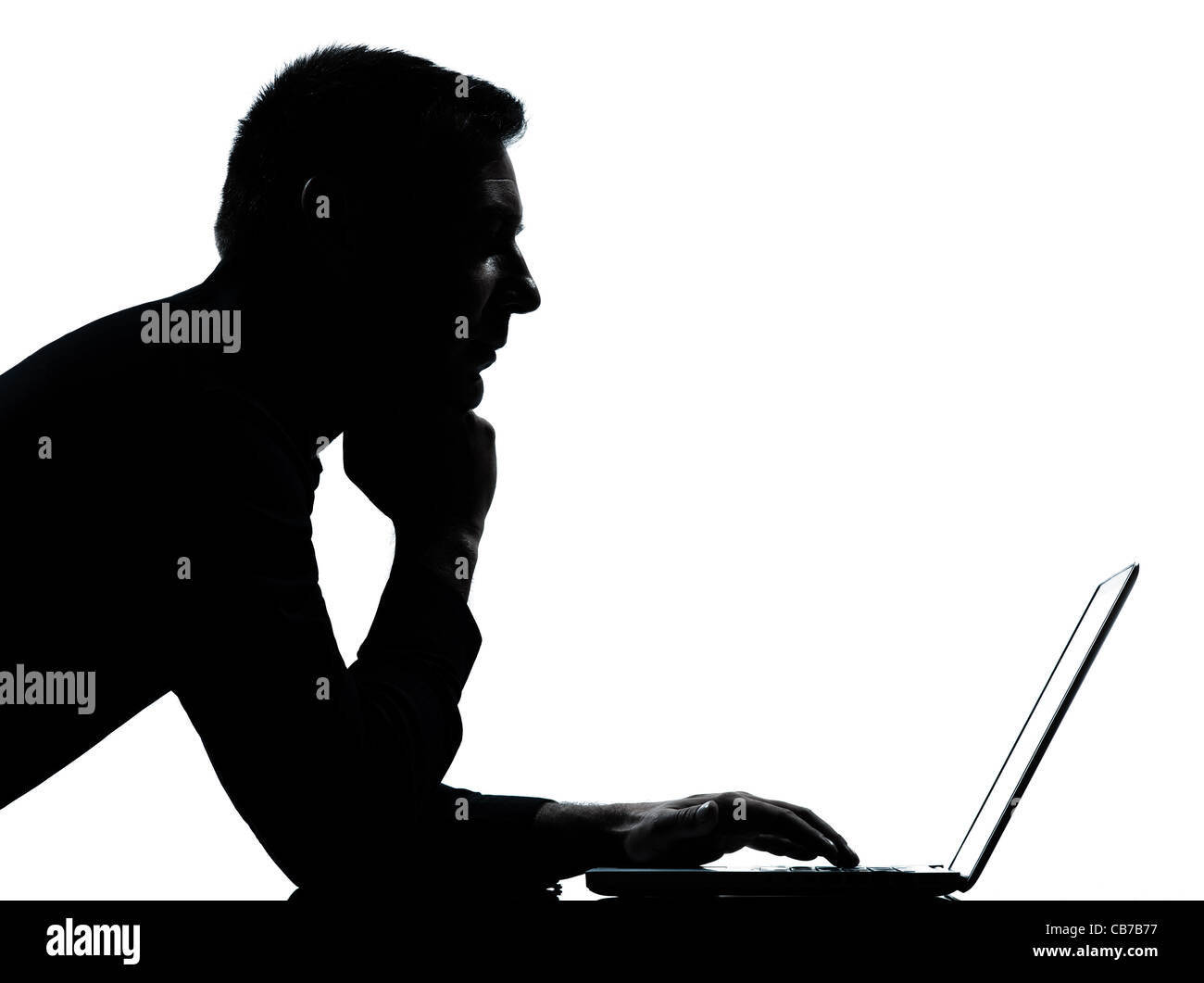 one business man computing computer laptop serious portrait silhouette ...