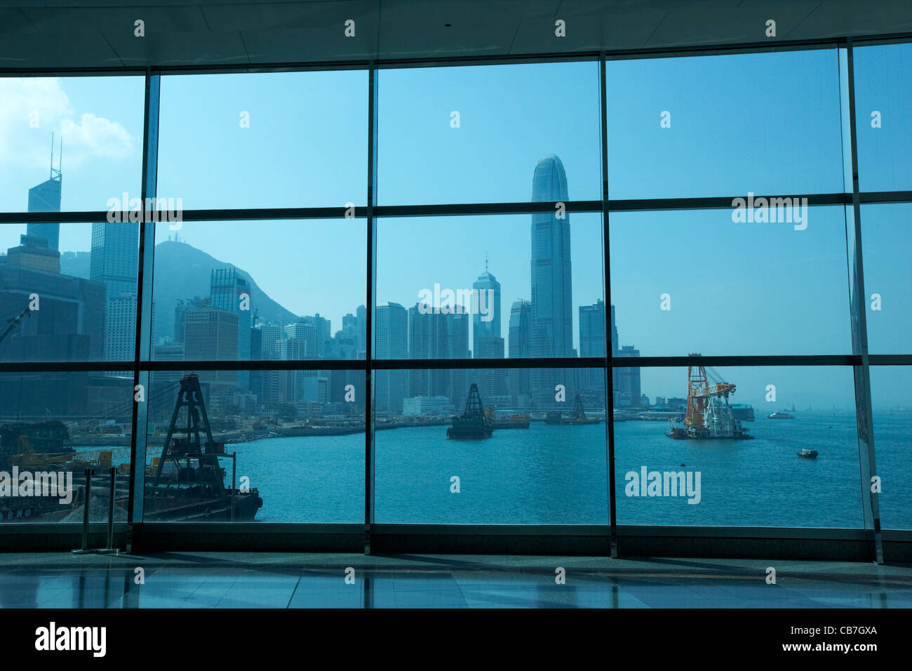 view of hong kong island seafront through the windows of the hong kong ...