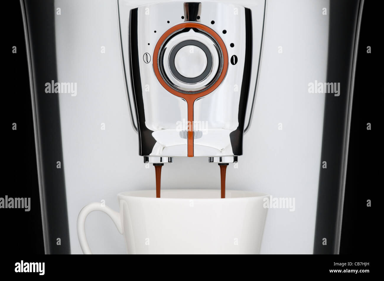 close up front view of modern automatic espresso coffee machine. White ...