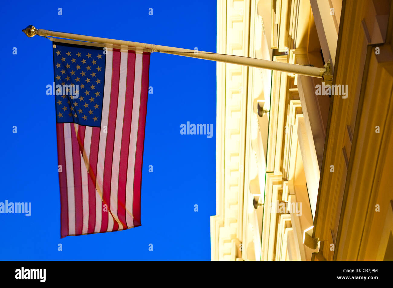 American flag waving from pole hi-res stock photography and images - Alamy